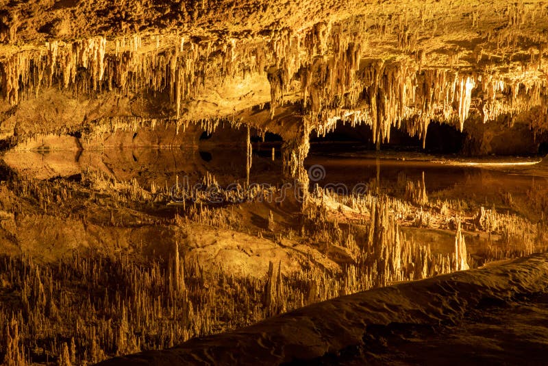 Underground Lake in Subterranean Cave Cavern Reflects Rock Formations ...
