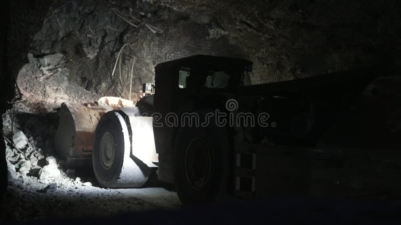 Underground Loader Picks Up Ore Mass with Bucket Stock Video - Video of ...