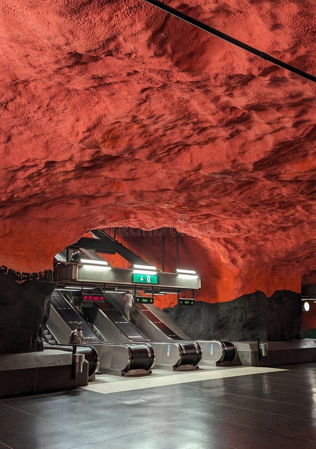 Underground Metro Station with Red Rock Ceiling. Stock Photo - Image of ...