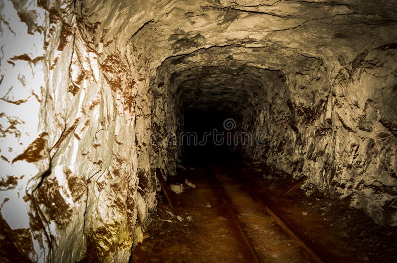Underground Mining Tunnel with Rails Stock Photo - Image of long, light ...