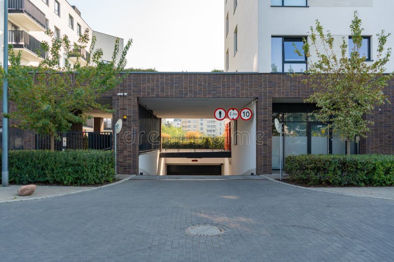 Underground Parking Garage Entrance at a Modern Residential Building ...