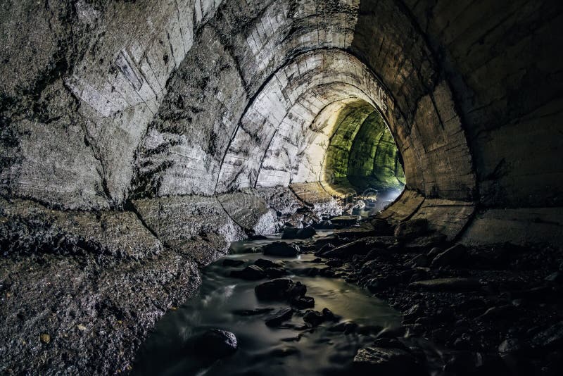 Underground River Flowing through Large Oviform Underground Turning ...