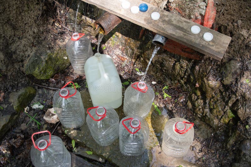 An Underground Source of Clean Fresh Water, Filled Canisters for a Home ...
