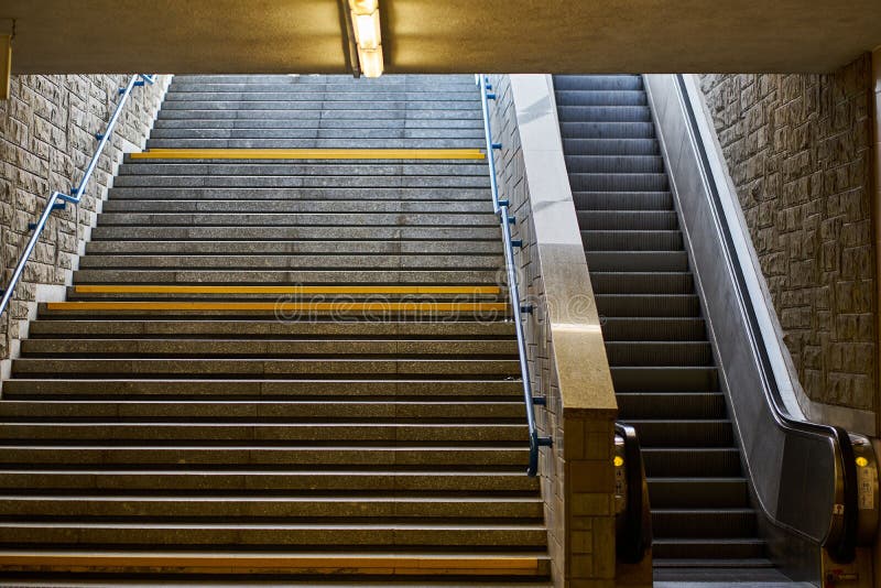 Underground Stairway Next To Escalator Stock Image - Image of stairs ...