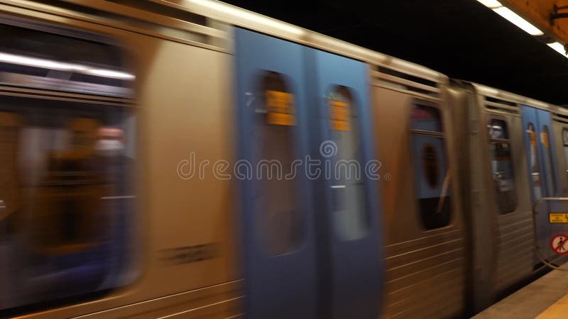 An Underground Subway Station Platform Featuring Stairs for Passenger ...