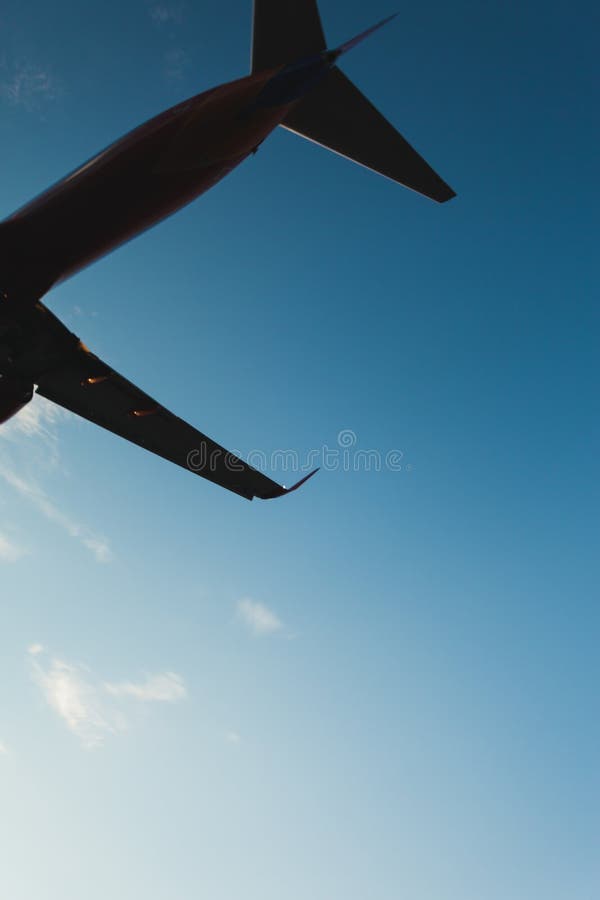 Underneath Airplane With Pretty Blue Sky And Clouds In ...
