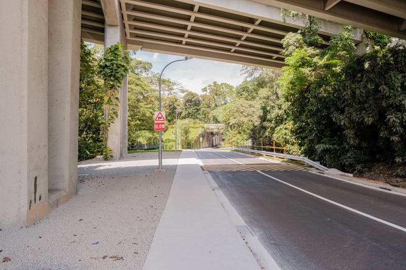 Underpass Bridge Road Slow Warning Stock Photo - Image of road ...
