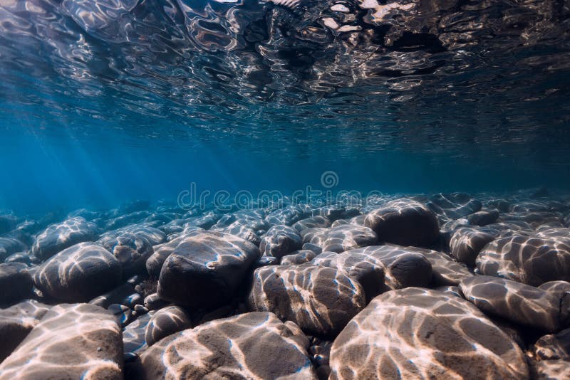 Undersea View with Stones Bottom, Reflection in Blue Water. Ocean ...