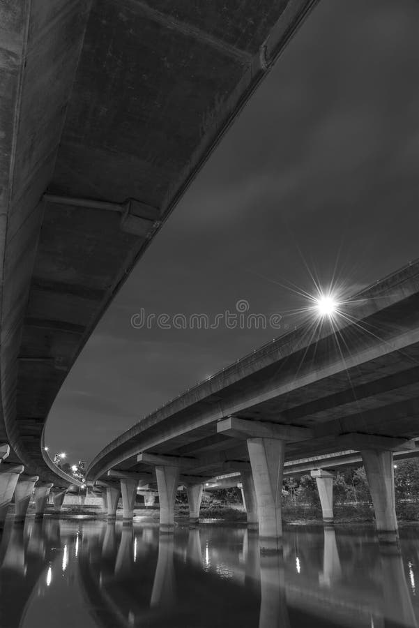 Underside of an Elevated Road Across River at Night Stock Image - Image ...