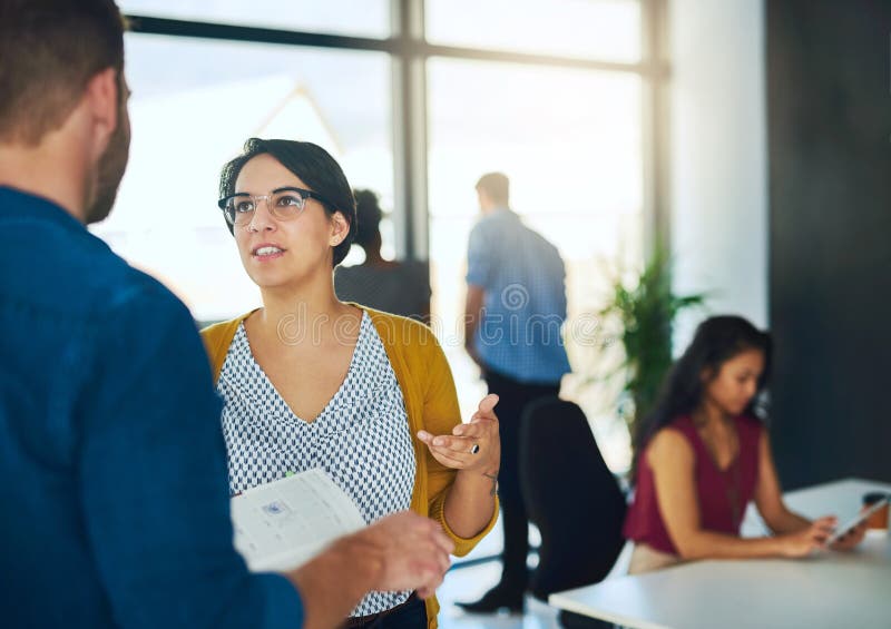 Understanding Each Others Vision. Colleagues Having a Discussion in a ...