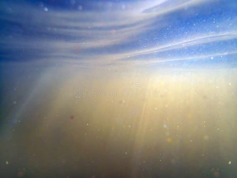 Underwater Camera View of Rippling Lake Water with Streaming Sunlight ...