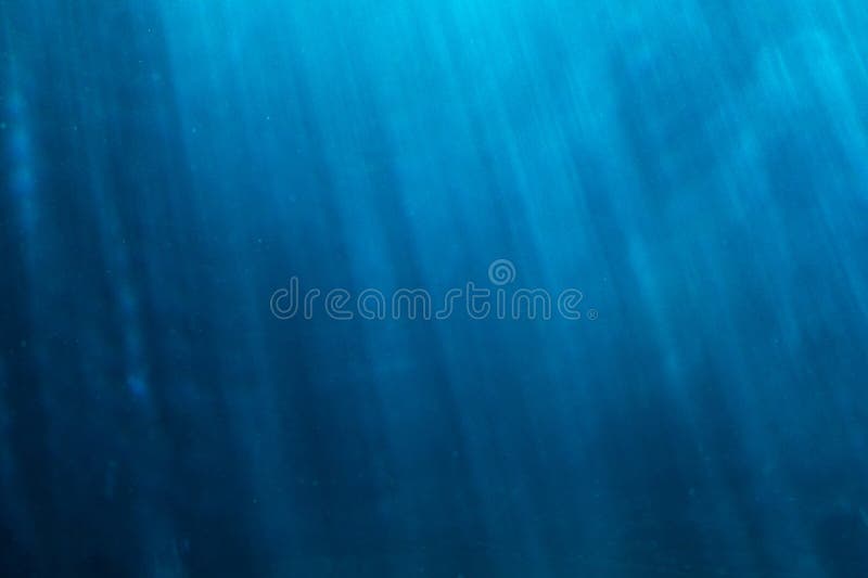 Underwater in Deep Blue Sea with Sunlight and Bubbles Stock Image ...