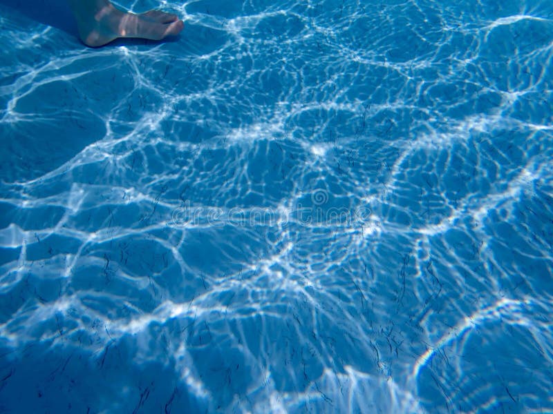 Underwater Foot Walking on Blue Pool Bottom with Ripples Stock Photo ...