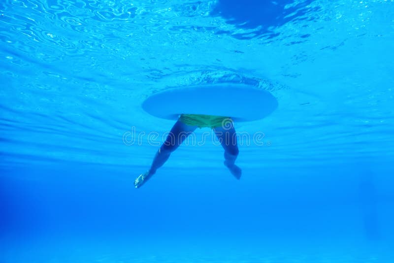 Underwater Photo of Boy with Float Swimming Stock Photo - Image of ...