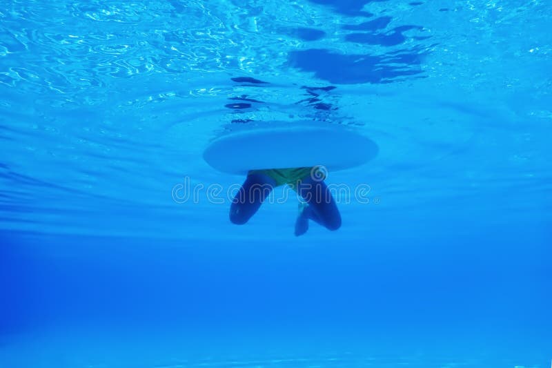Underwater Photo of Boy with Float Swimming Stock Photo - Image of ...