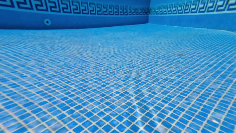 Underwater Pool Perspective Featuring a Captivating Grid Pattern on the ...