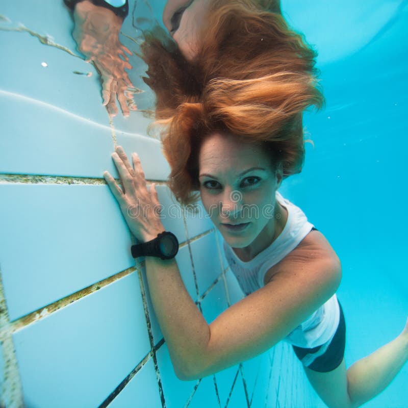Woman underwater in pool stock image. Image of fitness - 33580857