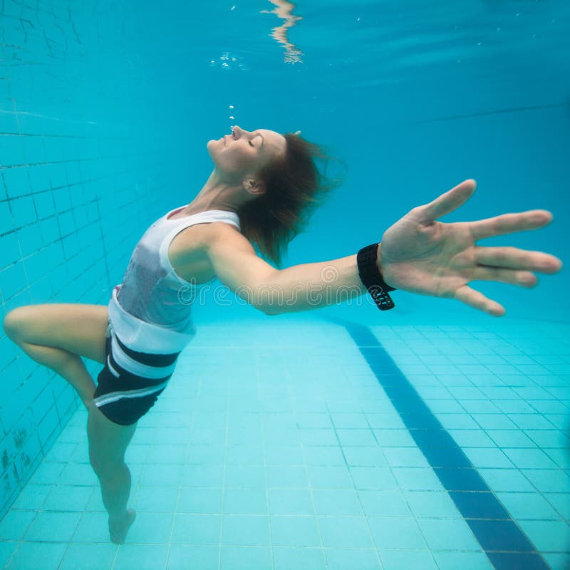 Woman underwater in pool stock image. Image of fitness - 33580857