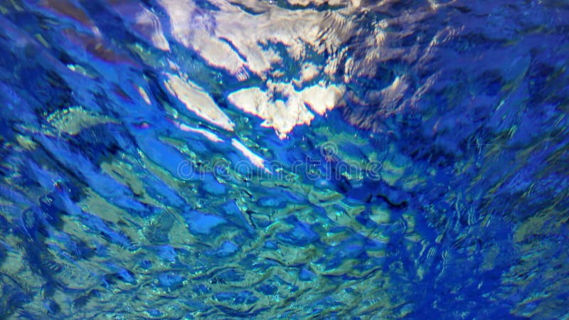 The Underwater Scenes of the Blue Sea Shines with Reflective Light from ...