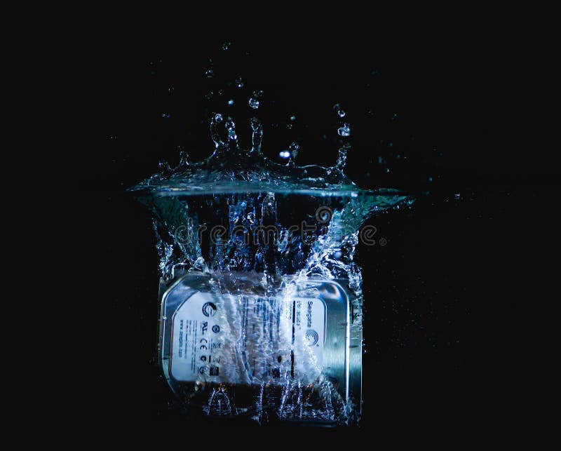 Hard Drive Drowning in Water Stock Photo - Image of black, water: 271614088
