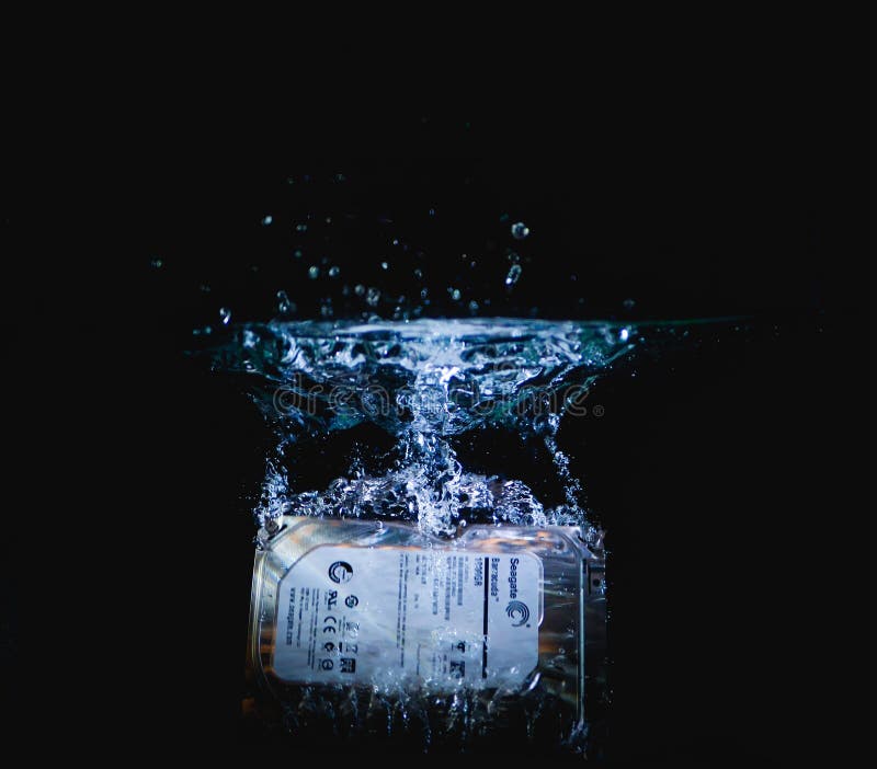 Hard Drive Drowning in Water Stock Photo - Image of computer, sink ...