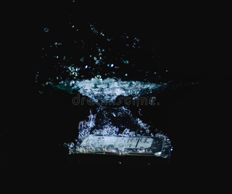 Hard Drive Drowning in Water Stock Photo - Image of underwater, bubbles ...