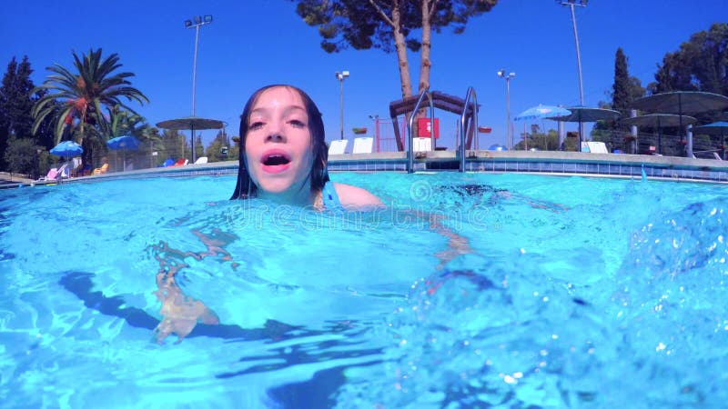 Underwater Shot of Two Kids Diving in a Swimming Pool Stock Footage ...