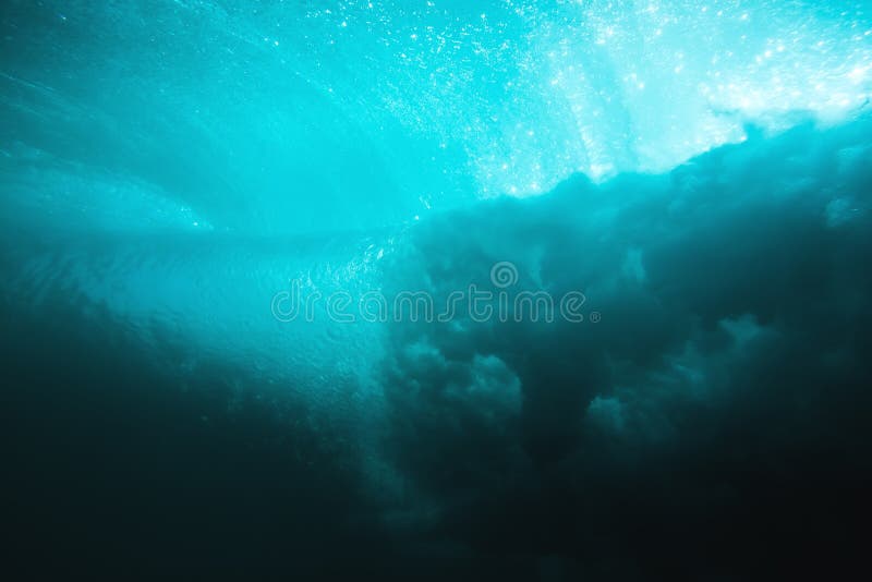 Underwater Surf Wave in Tropical Sea and Sun Rays. Water Texture in ...