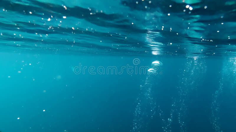 Underwater Surface with Bubbles and Sun Reflections in Blue Stock ...