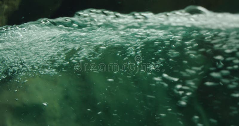 Underwater View of a Bubbling Current with Fast-moving Particles ...