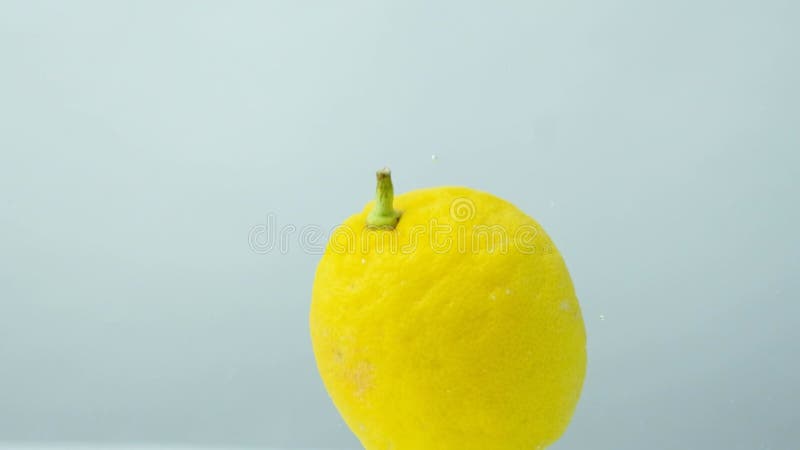 Underwater View of Fresh Whole Lemon with Tiny Bubbles Stock Footage ...
