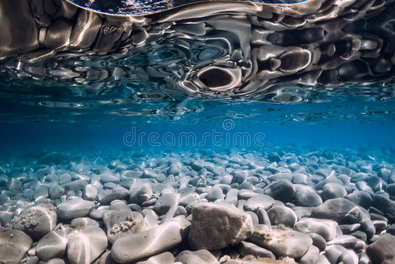 Underwater View with Stones Bottom, Reflection and Crystal Water Stock ...