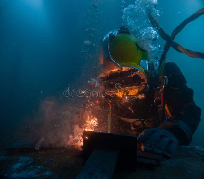 Underwater Welding in Deep Ocean Depths Stock Photo - Image of diver ...