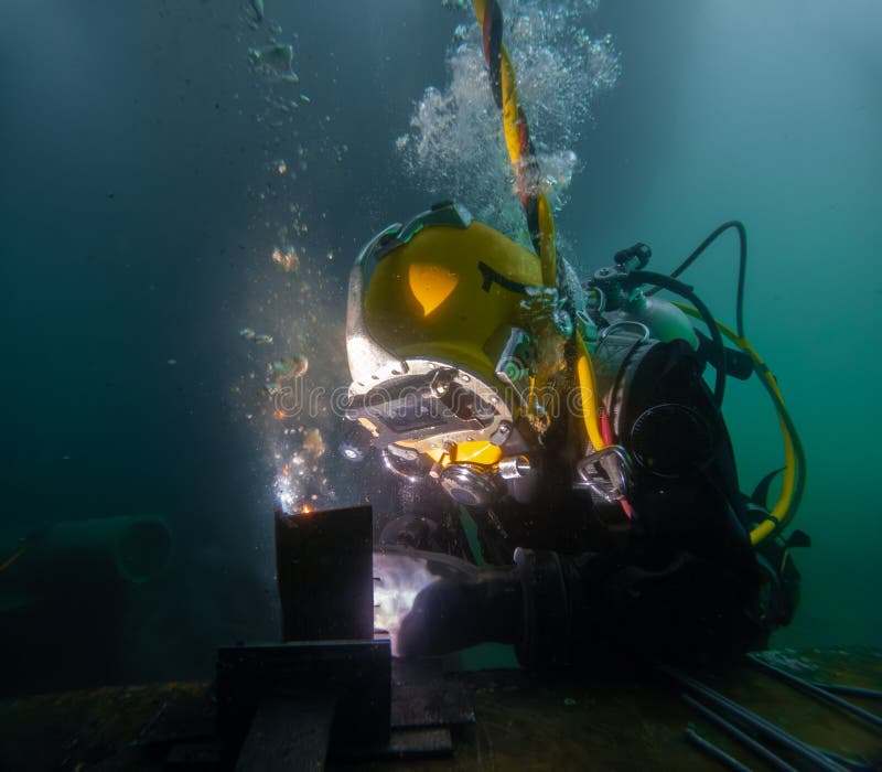Underwater Welding in Deep Ocean Depths Stock Photo - Image of diver ...