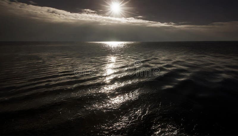 Undulating Surface of the Ocean with Sun Reflecting on the Surface ...