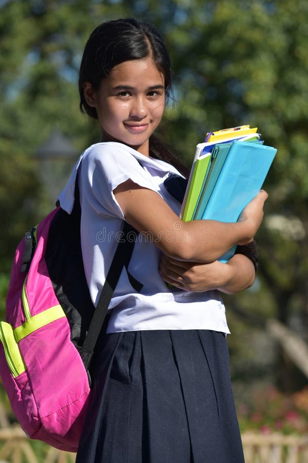 Unemotional Young Female Student Wearing Uniform with Backpack Stock ...
