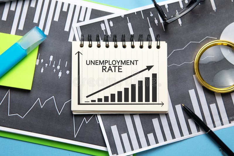 Unemployment Rate Graph on Notepad with a Business Objects Stock Photo ...