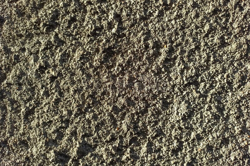 The Uneven Texture of the Cement Forms Abstract Patterns that are Well ...