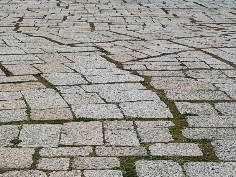 Unevenly laid stone tiles stock image. Image of park - 160104507