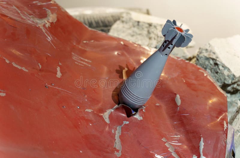 An Unexploded Shell Sticks Out in the Back of a Car. Stock Photo ...