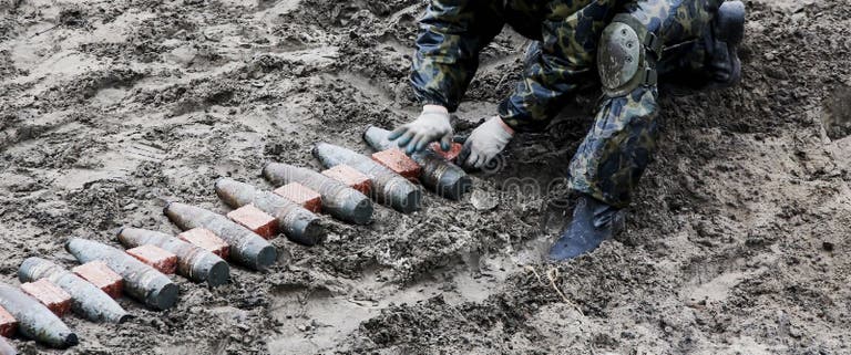 Clearing of Unexploded Ordnance after a Battle in a War, Undermining ...