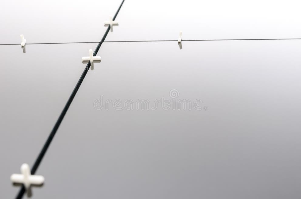 Unfinished Black Ceramic Tiles with Tile Spacers Stock Image - Image of ...