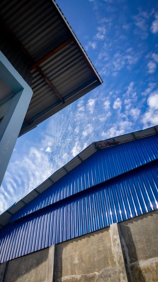 Unfinished Blue Building stock photo. Image of line - 251653802