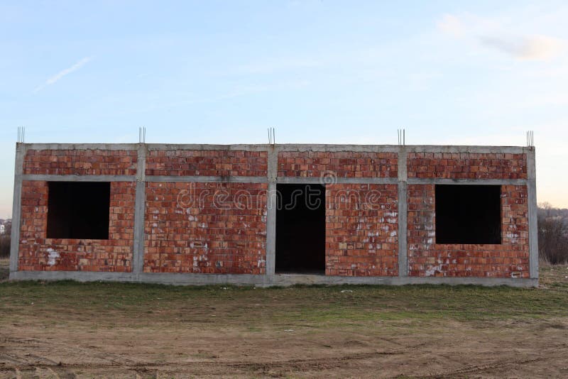 Unfinished brick house stock image. Image of architecture - 173558825