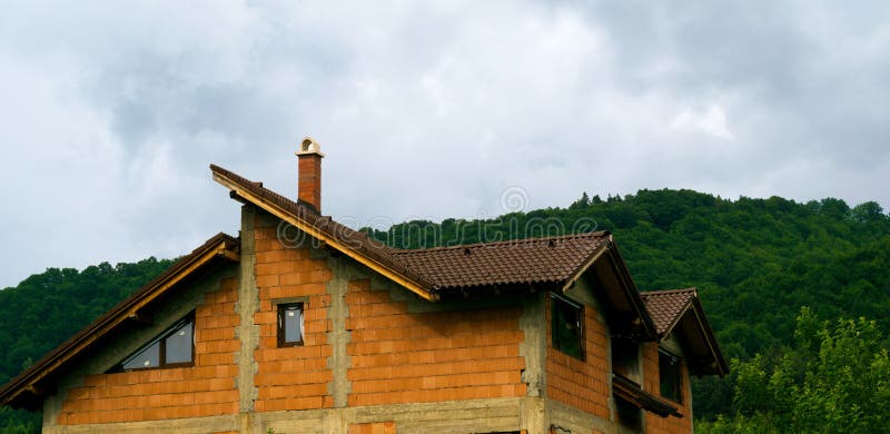Unfinished Brick House Under Construction with the Rooftop Installed ...