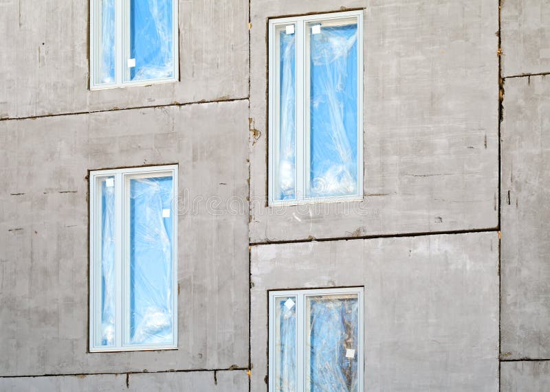 Unfinished Building Concrete Wall with Windows Stock Photo - Image of ...