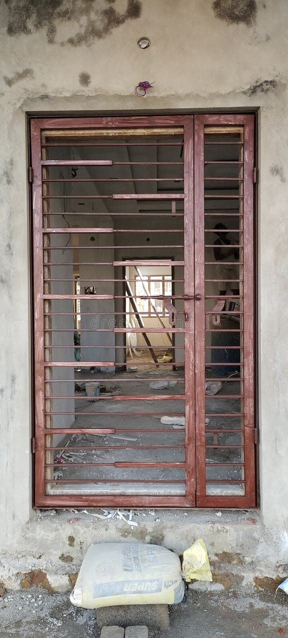 An Unfinished Building Facade Features a Rectangular Window Opening ...