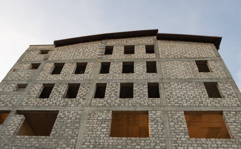 An Unfinished Building Under Construction, without Windows Stock Photo ...