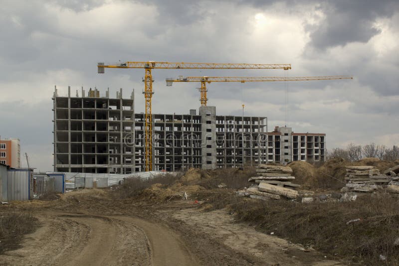 Unfinished Construction with Cranes View from Far. Building Concept ...
