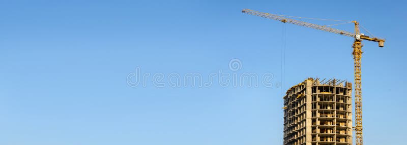 Unfinished Construction of High-rise Building with Cranes. Blue Sky ...
